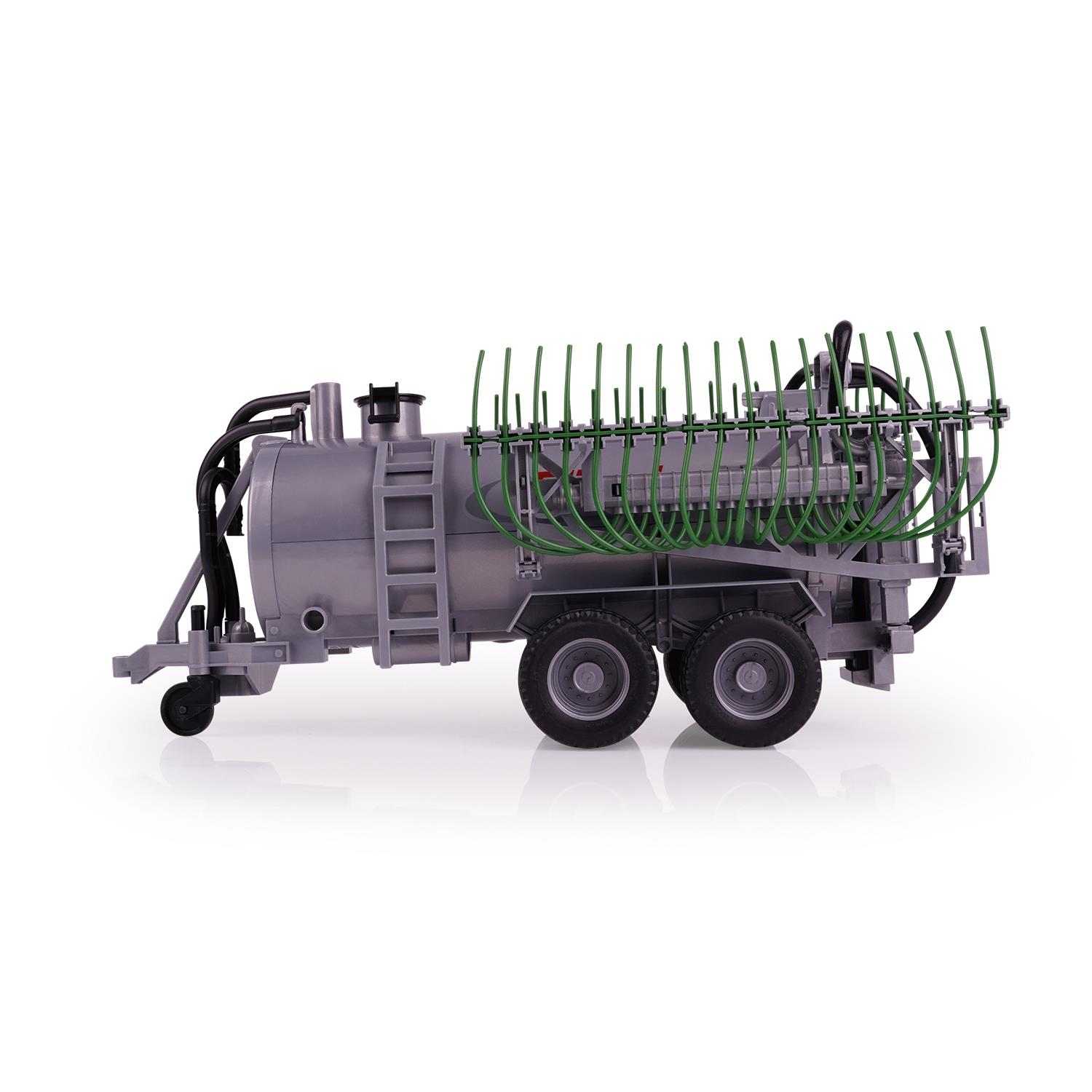 Steyr Fanshop. Fliegl barrel trailer with spread tubes